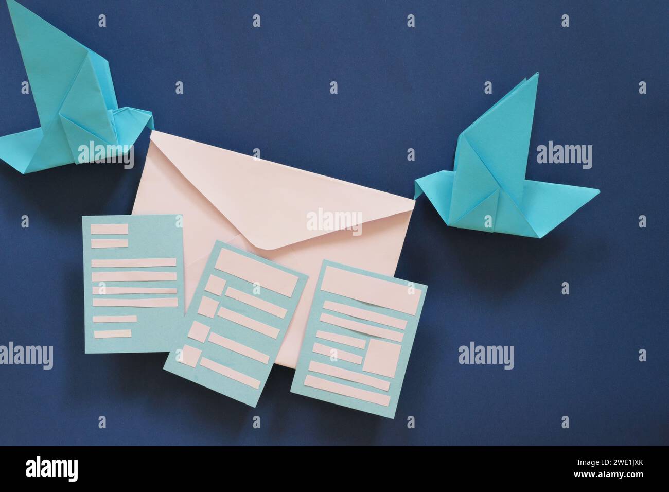 Two birds paper origami carrying letter envelope. Receiving email such ...