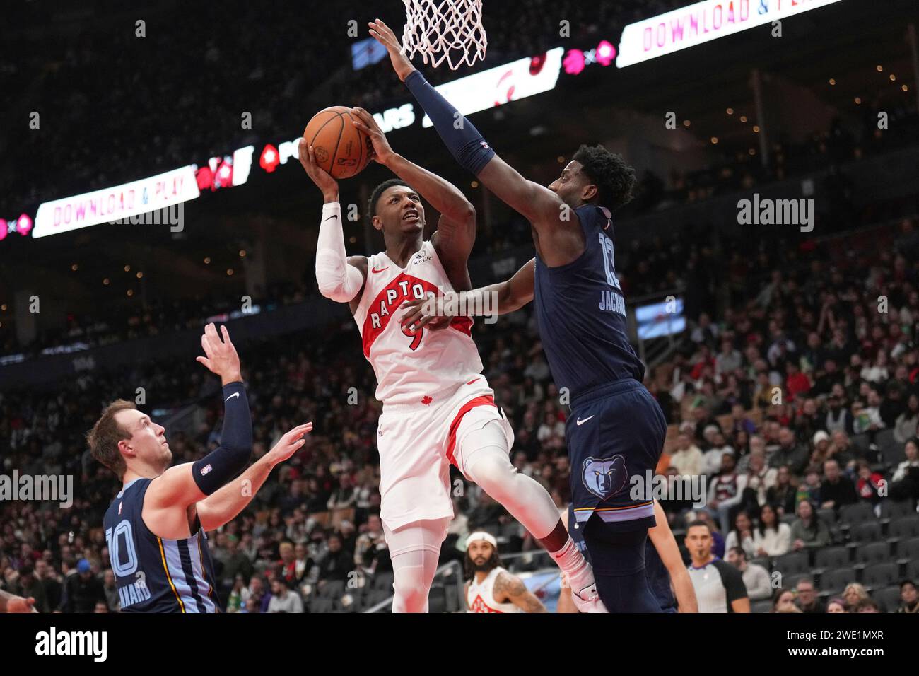 Toronto Raptors guard RJ Barrett (9) scores over Memphis Grizzlies ...