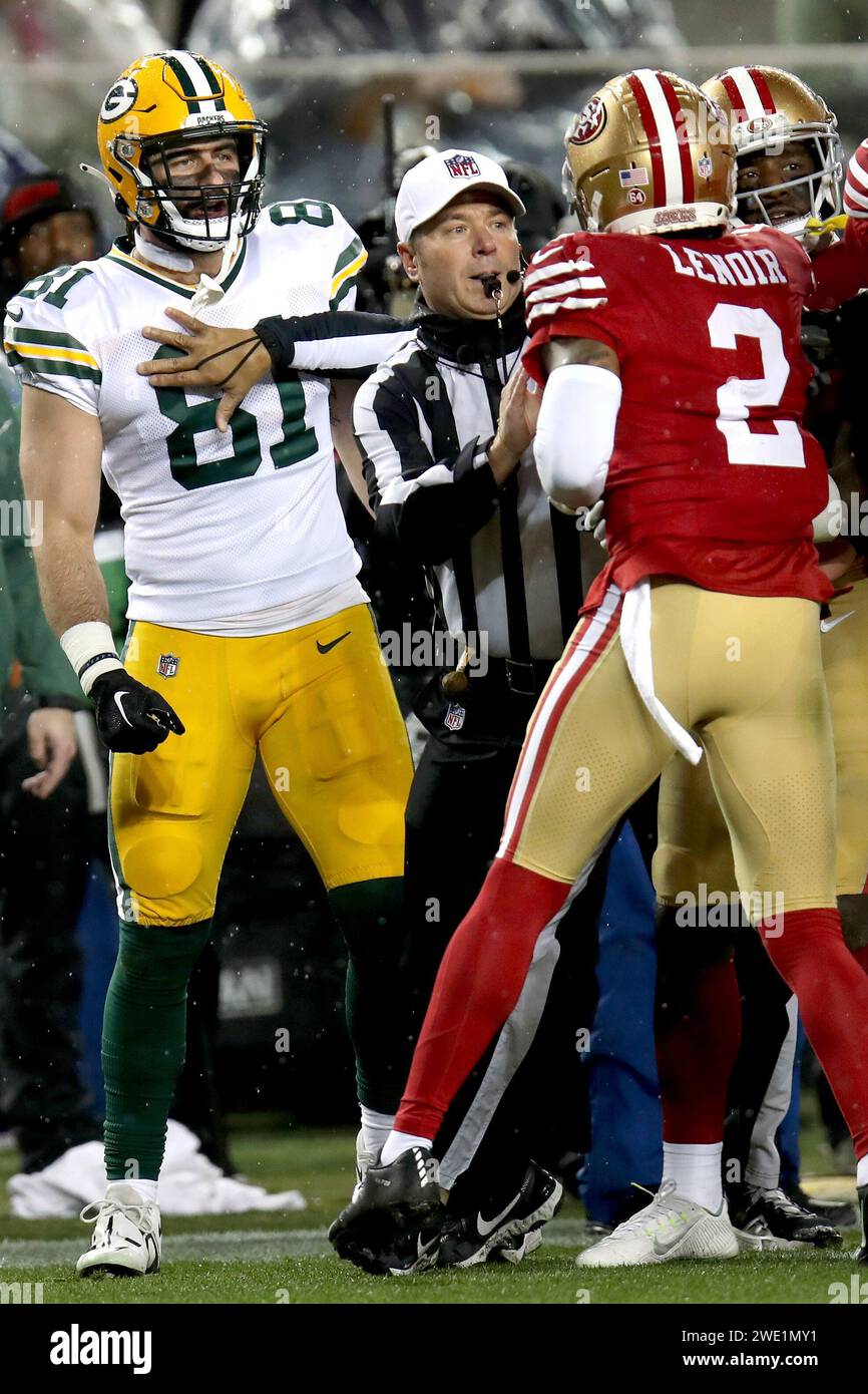 Referee Alex Kemp (55) separates players during an NFL divisional round ...