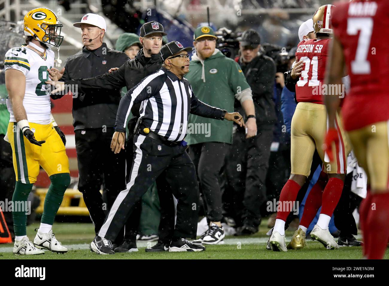 Field judge James Coleman (95) separates players during an NFL ...