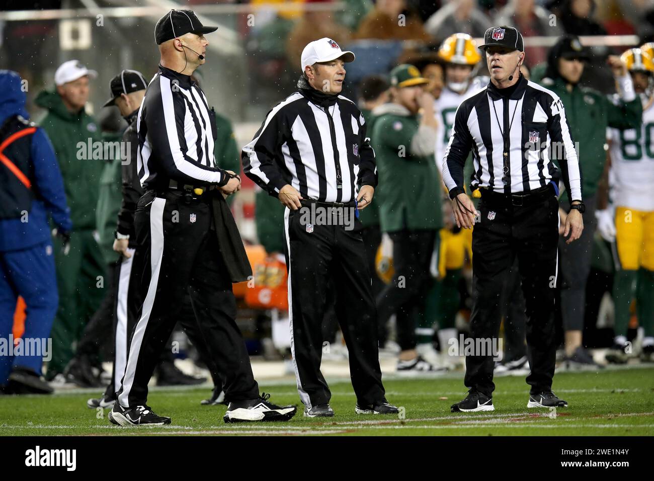 Umpire Mike Morton (89), referee Alex Kemp (55) and down judge Danny ...