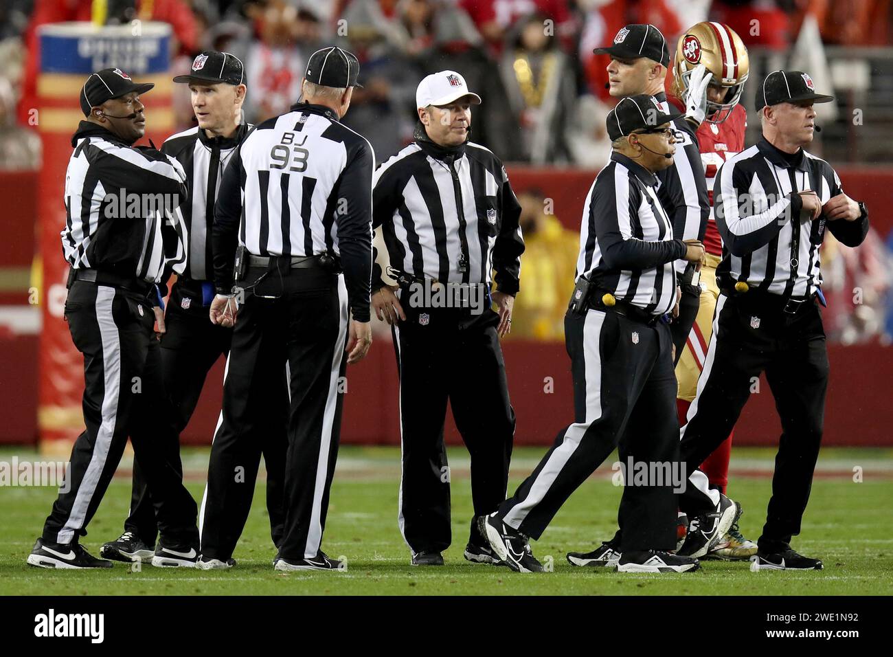 (L-R) Field judge John Jenkins (117), line judge Daniel Gallagher (85 ...