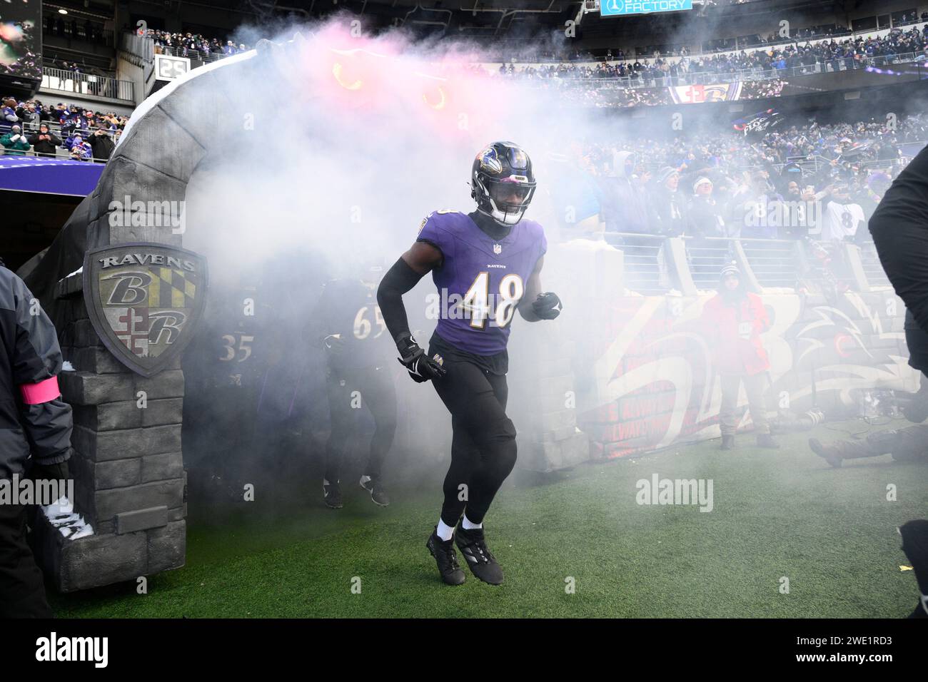 Baltimore Ravens linebacker Jeremiah Moon (48) takes to the field ...