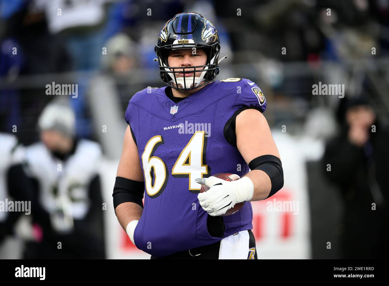 Baltimore Ravens center Tyler Linderbaum (64) works out before an NFL ...