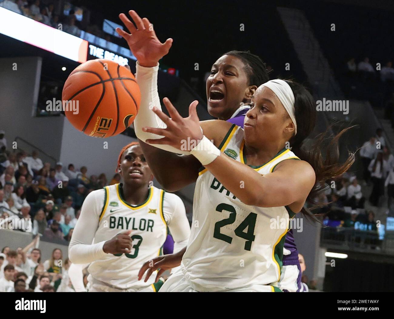 Baylor guard Sarah Andrews (24) attempts a steal over Kansas State ...