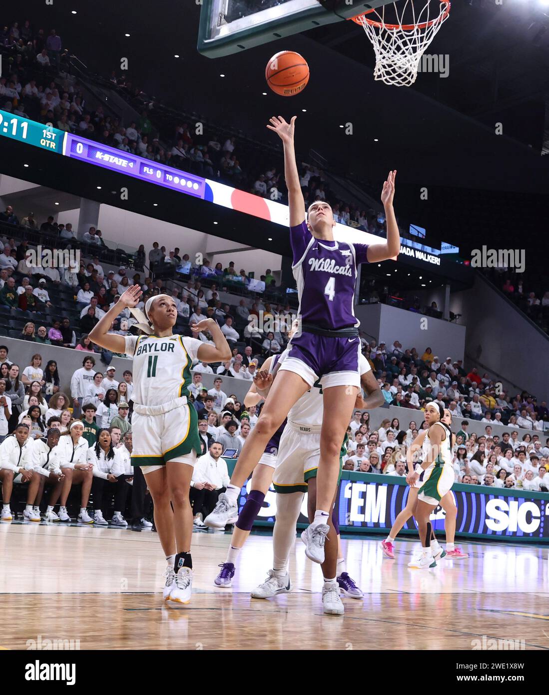 Kansas State guard Serena Sundell (4) scores past Baylor guard Jada ...