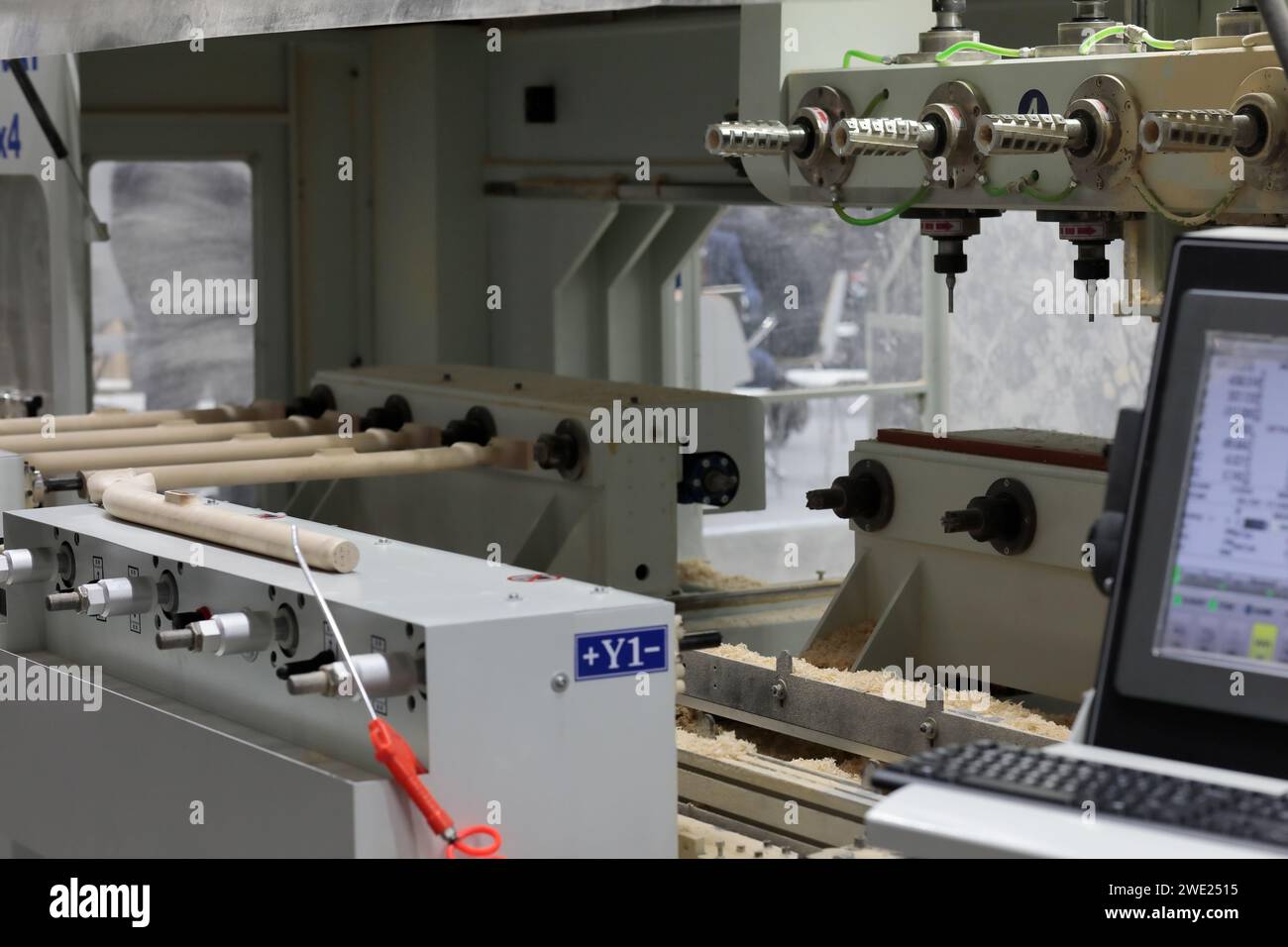 Multi heads CNC furniture carving router machine. Selective focus Stock ...