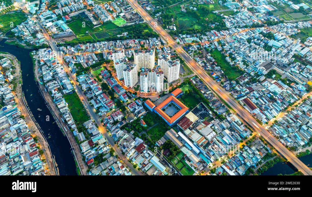 Aerial view of Saigon cityscape at evening with sunset sky in Southern ...