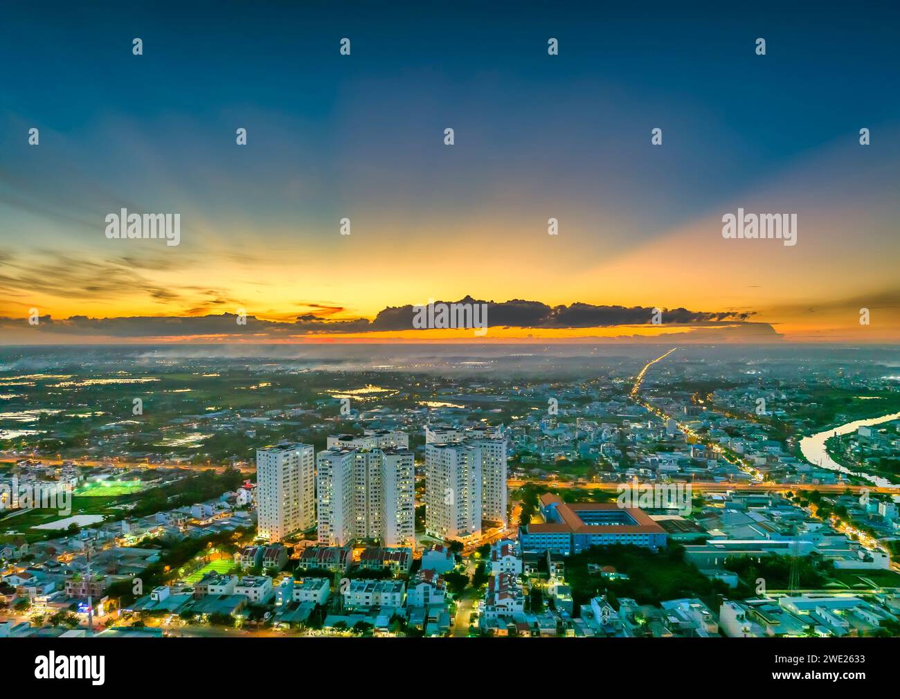 Aerial view of Saigon cityscape at evening with sunset sky in Southern ...
