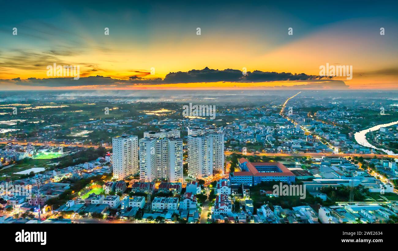 Aerial view of Saigon cityscape at evening with sunset sky in Southern ...
