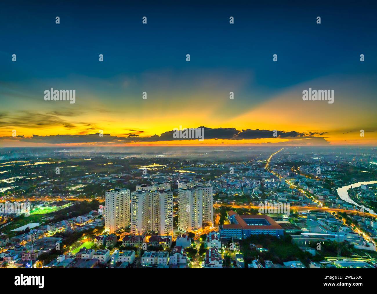 Aerial view of Saigon cityscape at evening with sunset sky in Southern ...