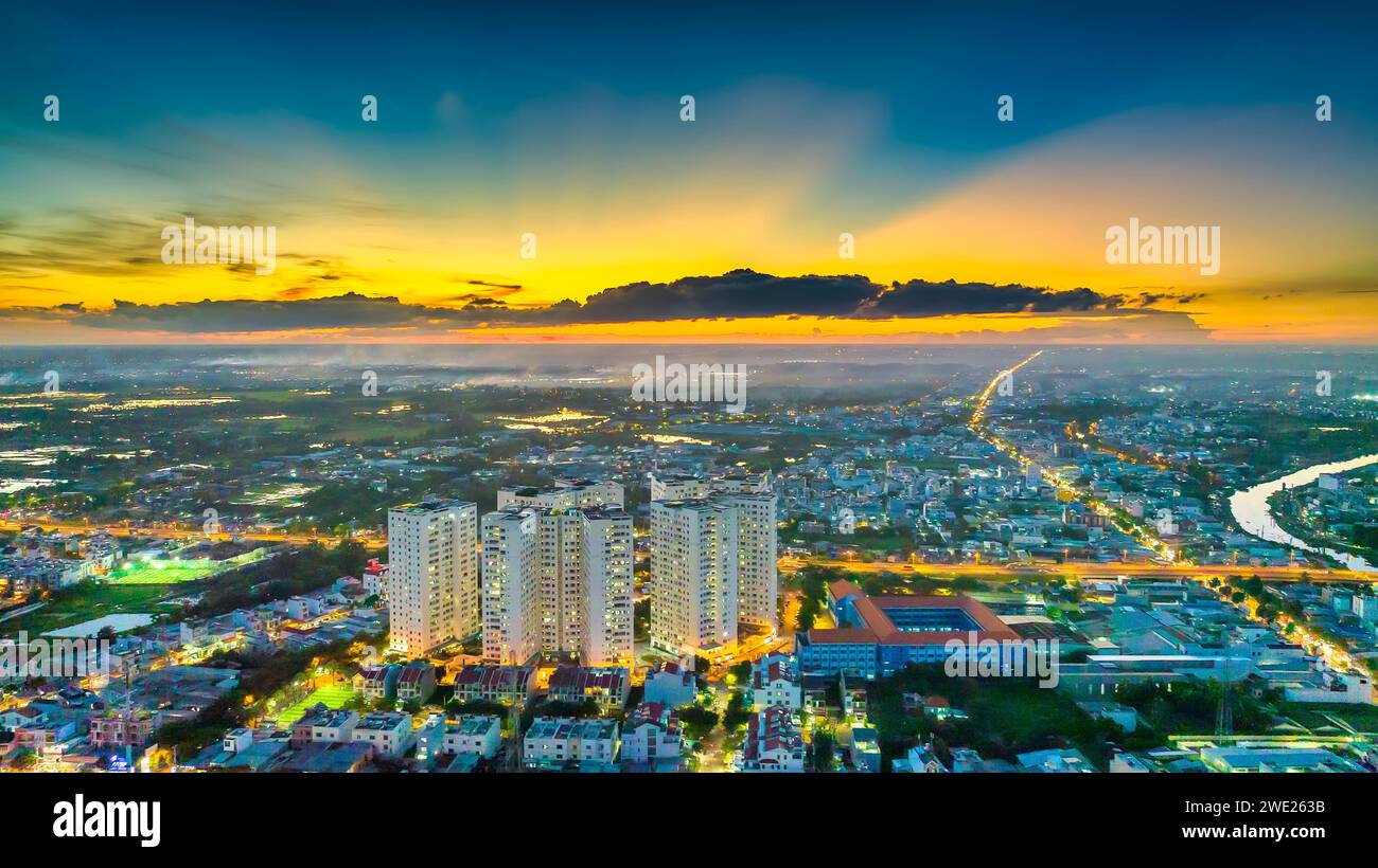 Aerial view of Saigon cityscape at evening with sunset sky in Southern ...