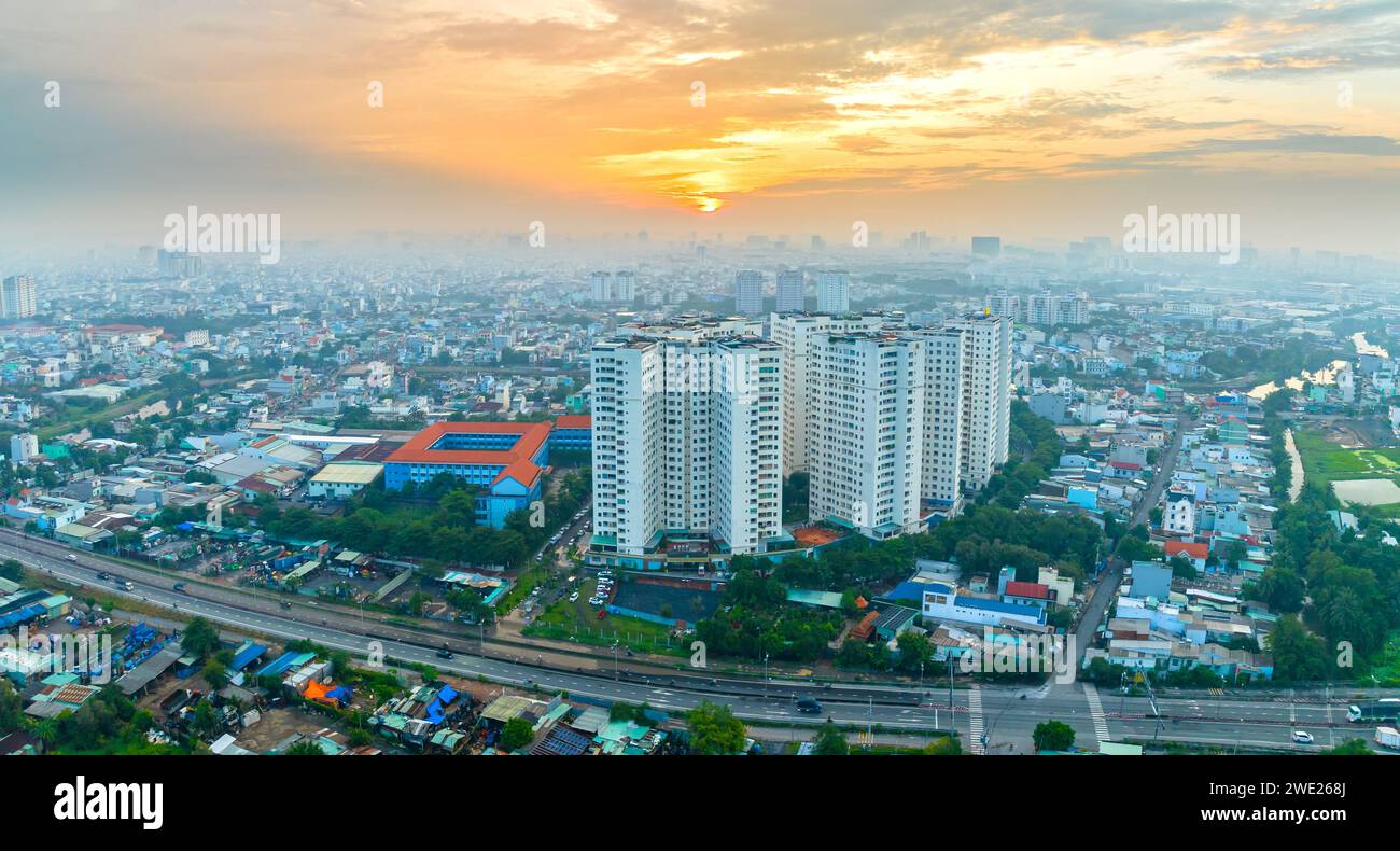 Aerial view of Saigon cityscape at morning with sunrise sky in Southern ...