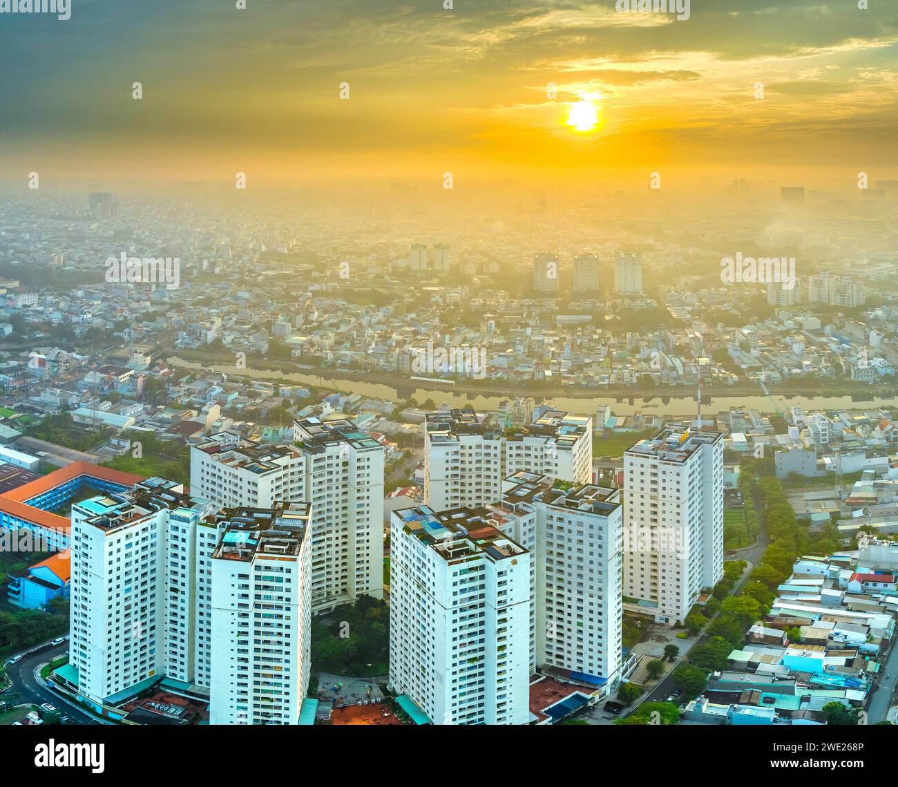 Aerial view of Saigon cityscape at morning with sunrise sky in Southern ...