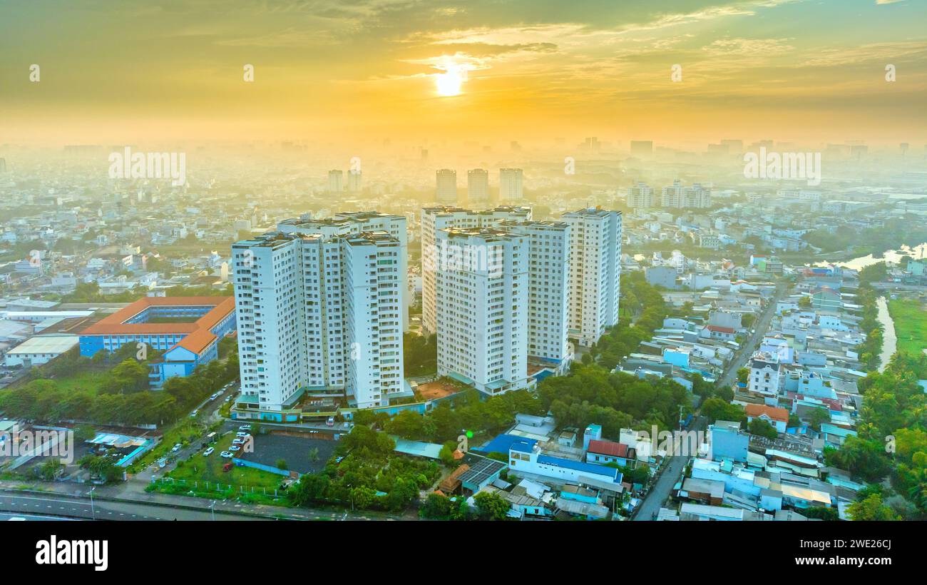Aerial view of Saigon cityscape at morning with sunrise sky in Southern ...
