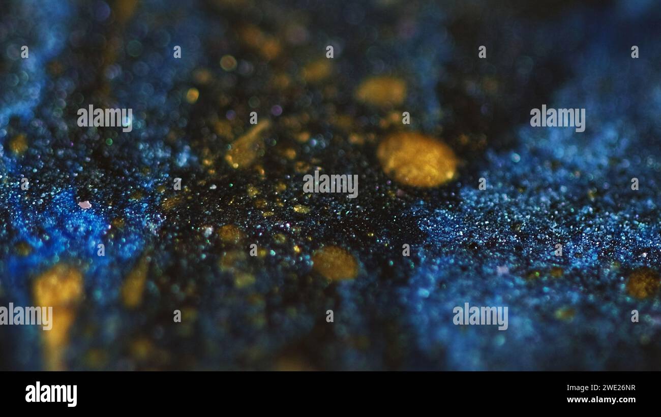 Glitter oil texture sparkling bubbles blue yellow Stock Photo - Alamy