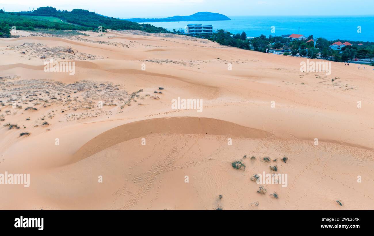Stark geographical contrast between sand and water near Mui Ne, Vietnam ...
