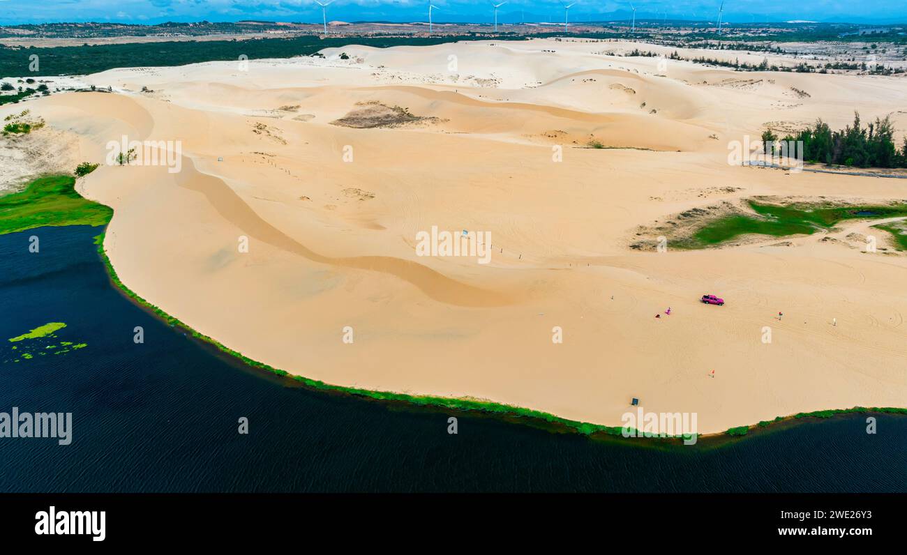 Stark geographical contrast between sand and water near Mui Ne, Vietnam ...