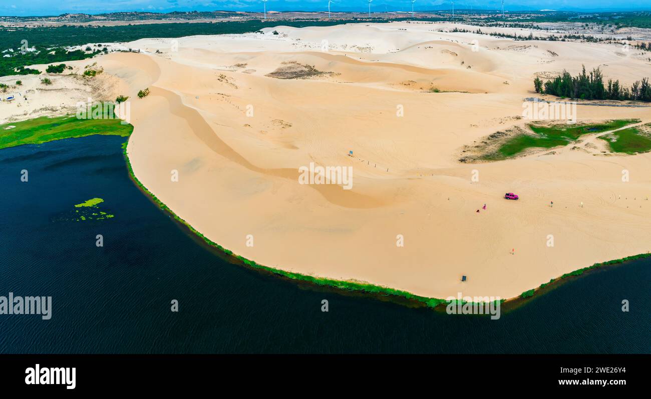 Stark geographical contrast between sand and water near Mui Ne, Vietnam ...