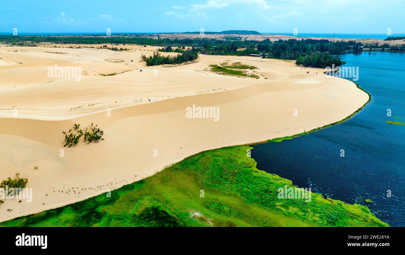 Stark geographical contrast between sand and water near Mui Ne, Vietnam ...
