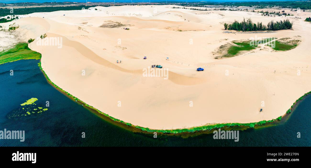 Stark geographical contrast between sand and water near Mui Ne, Vietnam ...