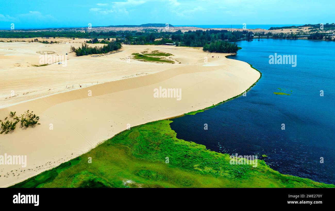 Stark geographical contrast between sand and water near Mui Ne, Vietnam ...