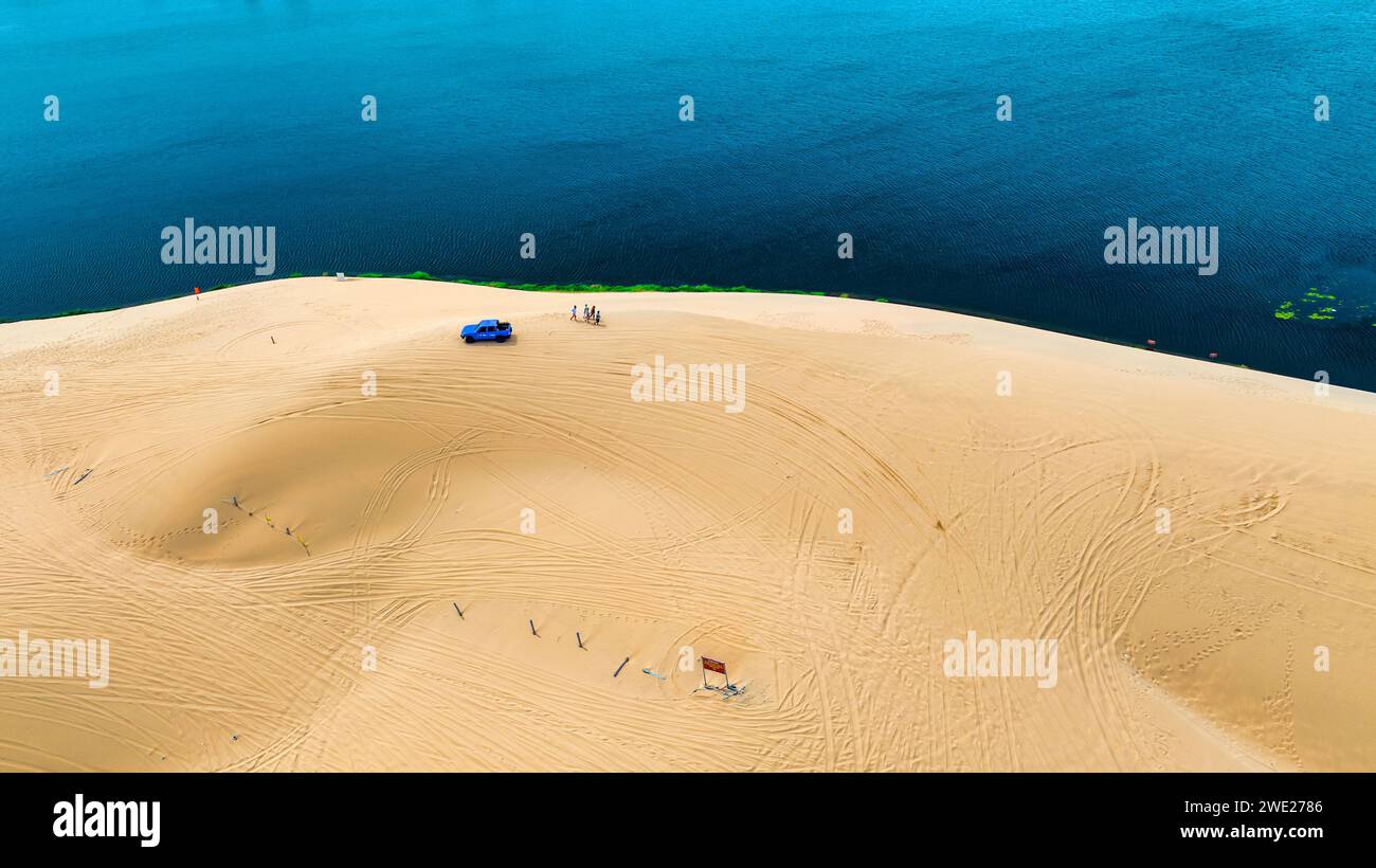 Stark geographical contrast between sand and water near Mui Ne, Vietnam ...