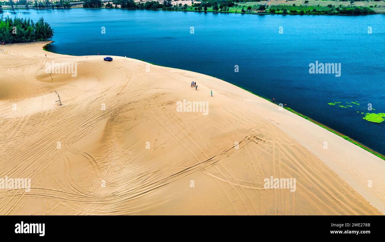 Stark geographical contrast between sand and water near Mui Ne, Vietnam ...