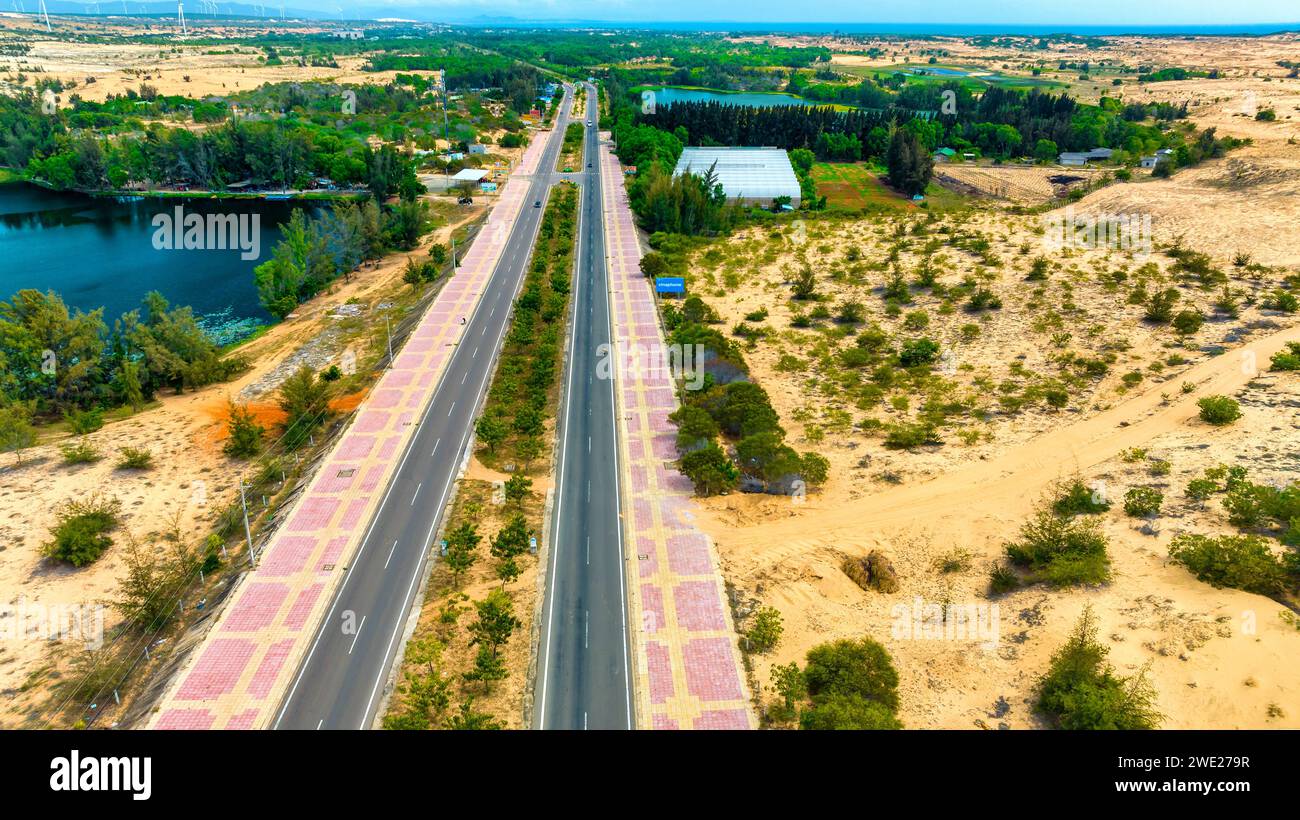 Aerial view of highway in the desert, Mui Ne, Vietnam. This is ...