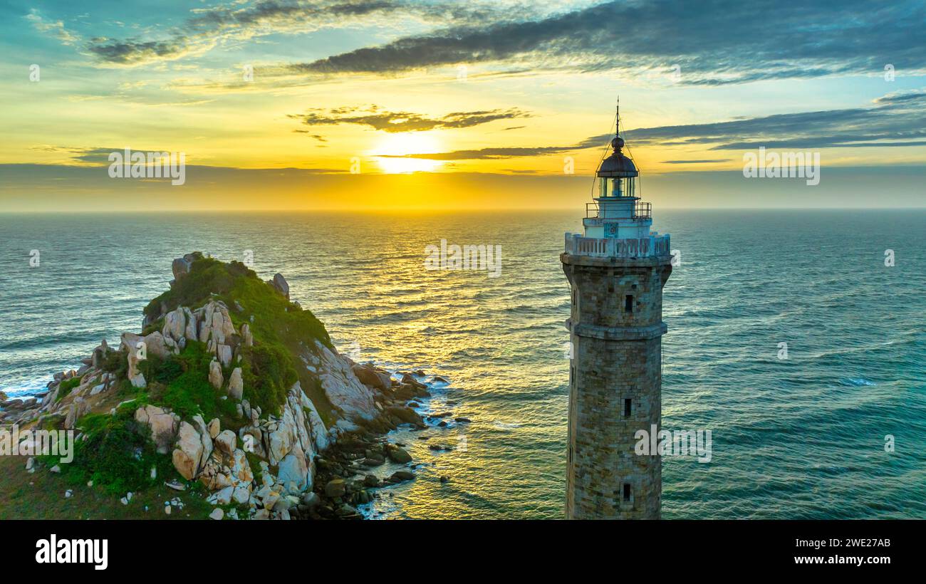 Ke Ga lighthouse is located on an island near the shore seen from above ...