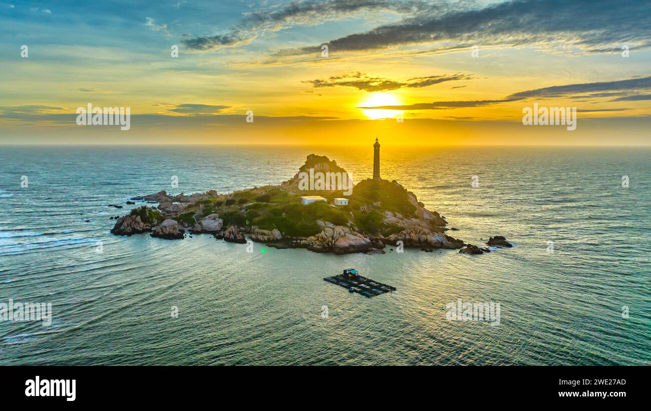 Ke Ga lighthouse is located on an island near the shore seen from above ...