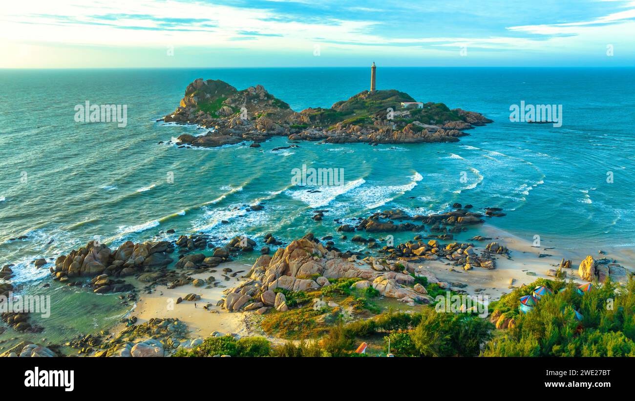 Ke Ga lighthouse is located on an island near the shore seen from above ...