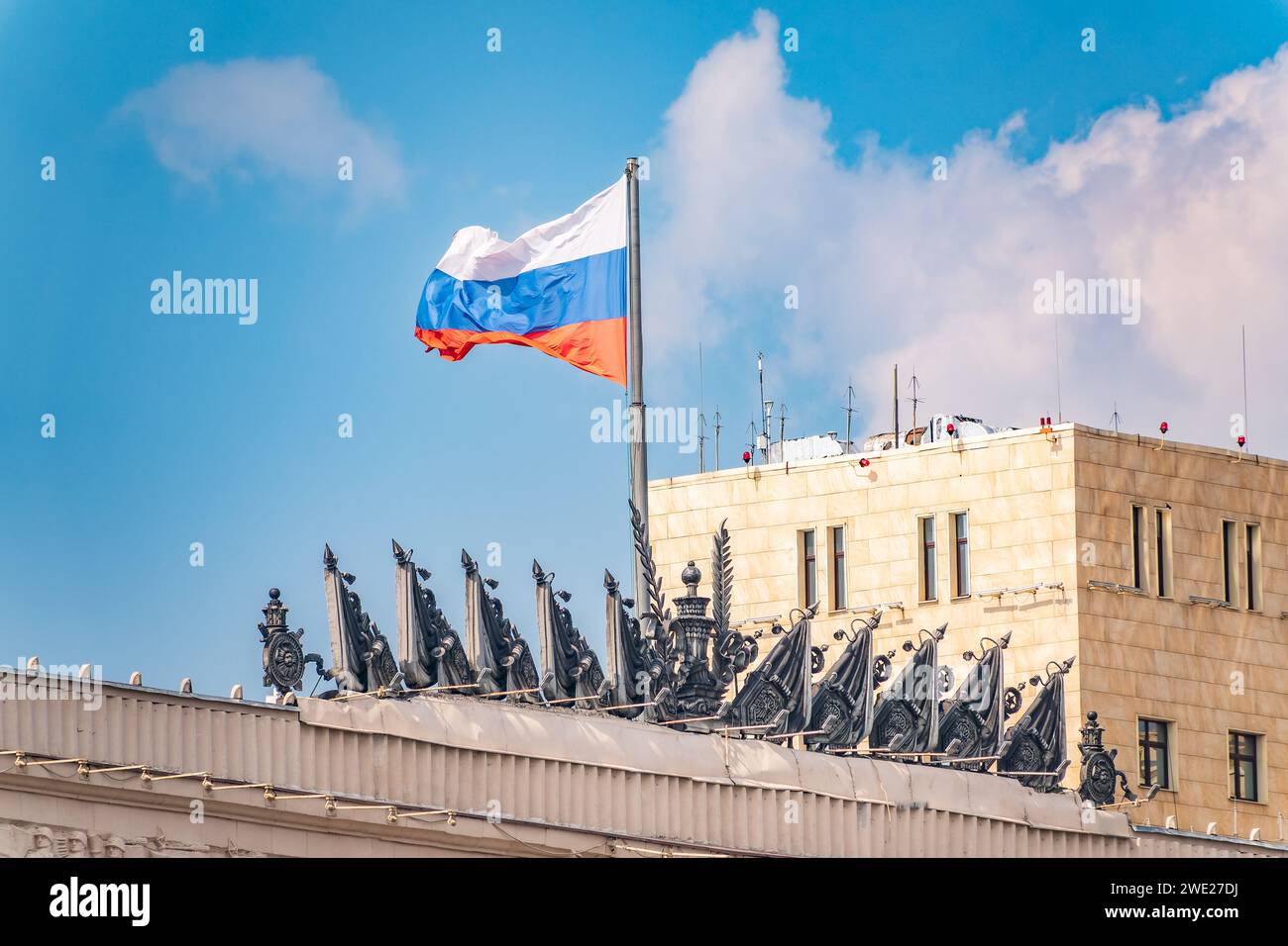 Waving national flag of russian federation on top of government stalin ...
