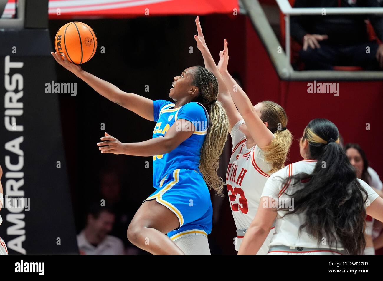 UCLA guard Charisma Osborne, left, goes to the basket as Utah guard ...