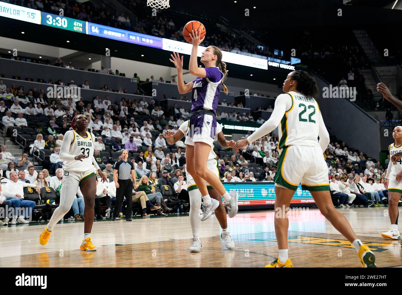 Kansas State guard Serena Sundell (4) looks to take a shot between ...