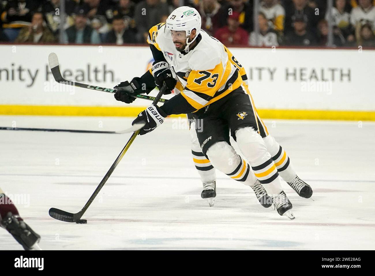 Pittsburgh Penguins' Pierre-Olivier Joseph (73) brings the puck up ice ...