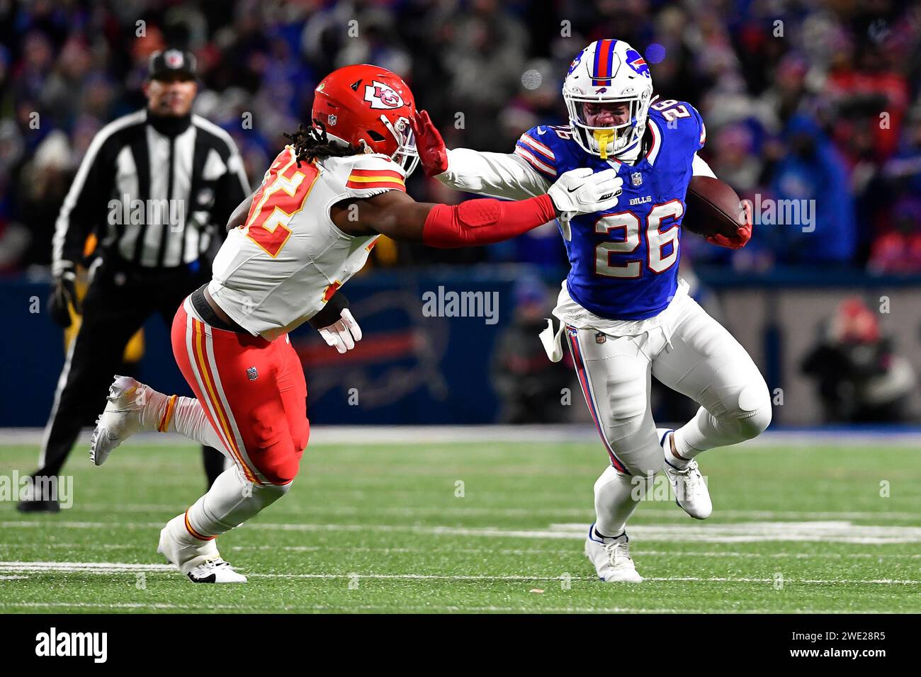 Buffalo Bills running back Ty Johnson (26) stiff arms Kansas City ...