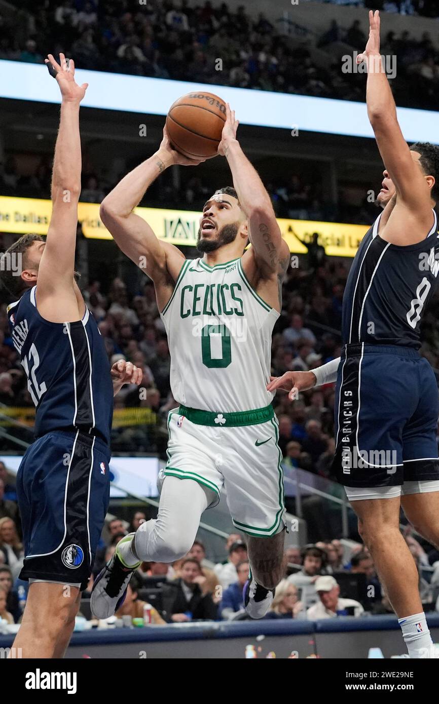 Boston Celtics forward Jayson Tatum (0) looks to shoot against Dallas ...