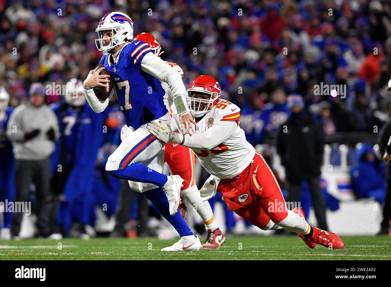 Buffalo Bills quarterback Josh Allen (17) is tackled by Kansas City ...