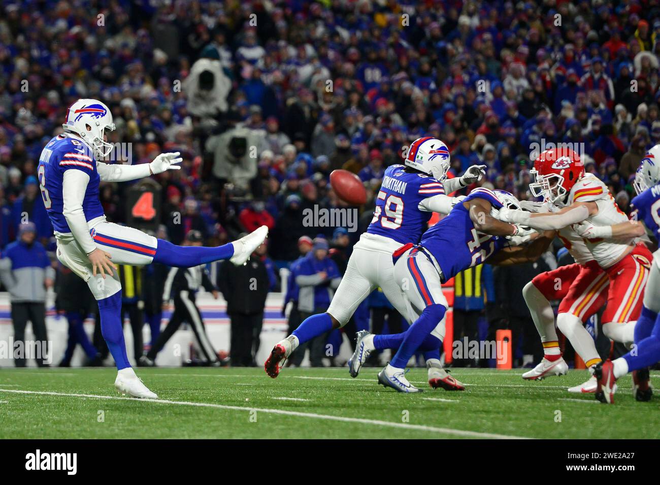 Buffalo Bills punter Sam Martin (8) punts the ball during the first half of an NFL AFC division ...