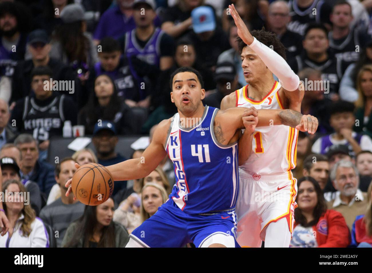 Sacramento Kings forward Trey Lyles (41) is guarded by Atlanta Hawks ...