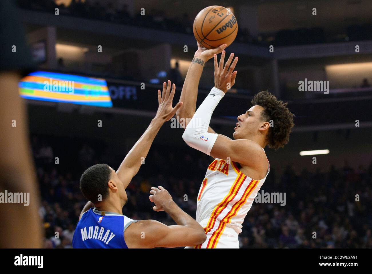 Atlanta Hawks forward Jalen Johnson, right, shoots over Sacramento ...