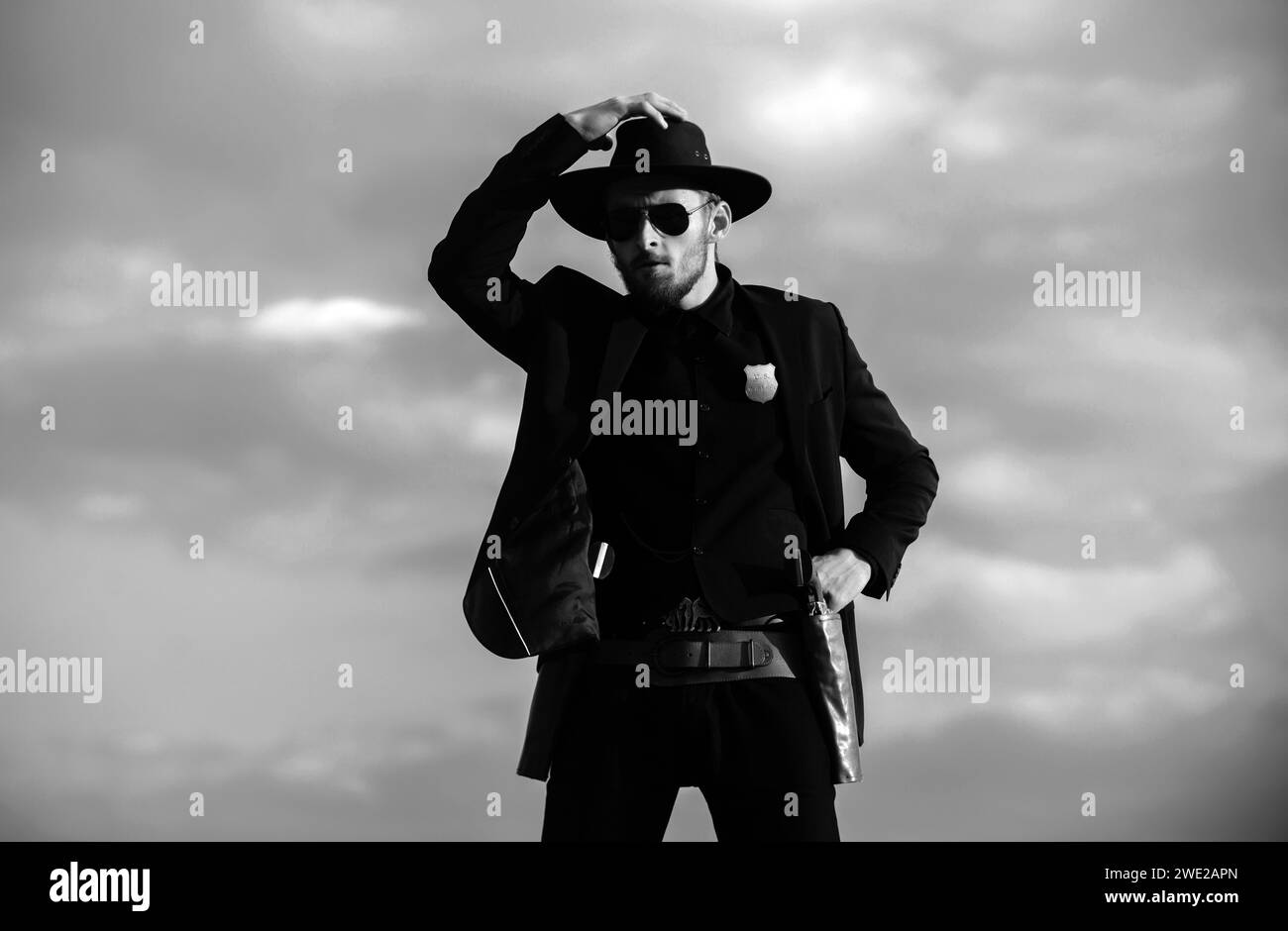 Cowboy shooter in cowboy hat. Serious man with wild west guns, retro ...