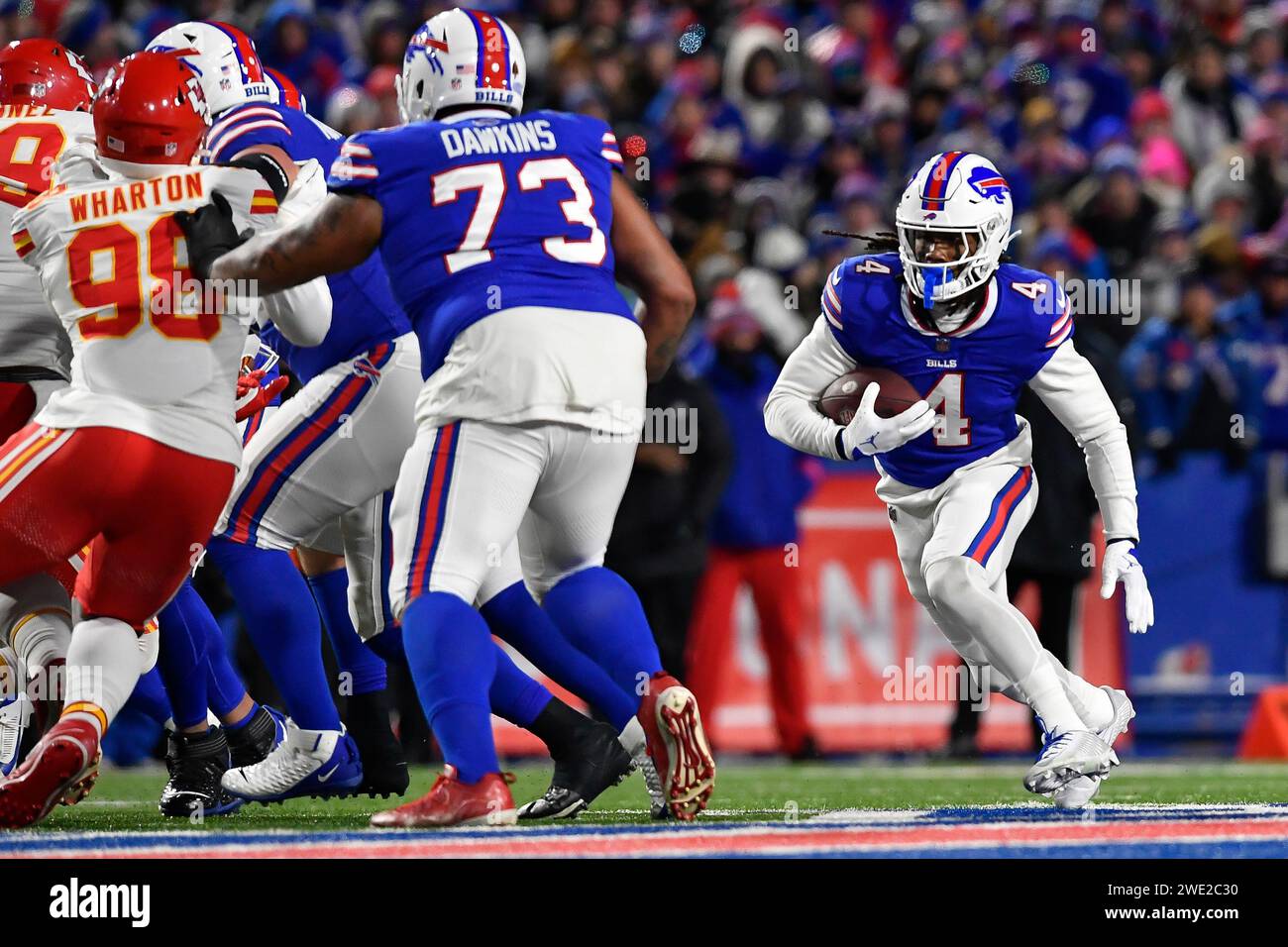 Buffalo Bills running back James Cook (4) runs with the ball during the ...