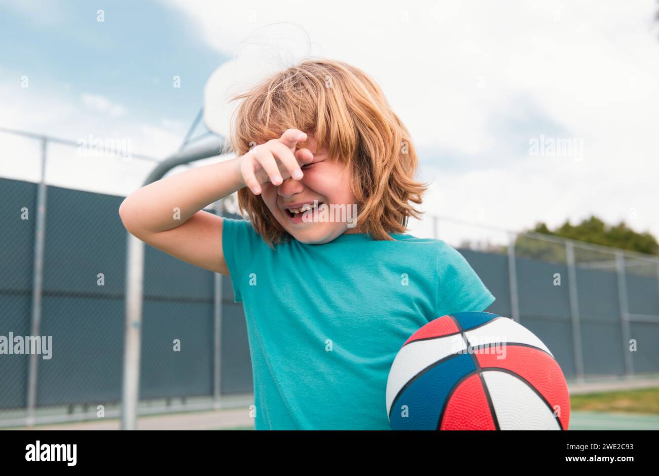 Little boy alone, lonely with ball. Loneliness kids. Sad child boy ...