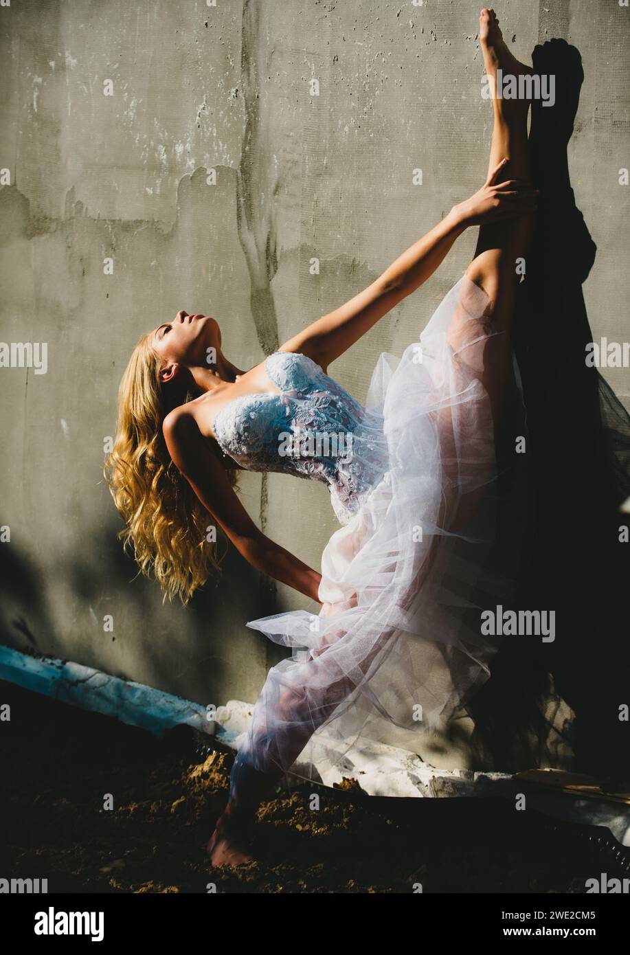 Art ballet. Leg-split, flexible girl doing split. Fitness sport woman ...