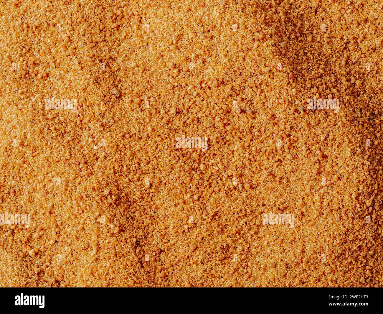Background texture of raw organic coconut sugar from crystallized sap ...
