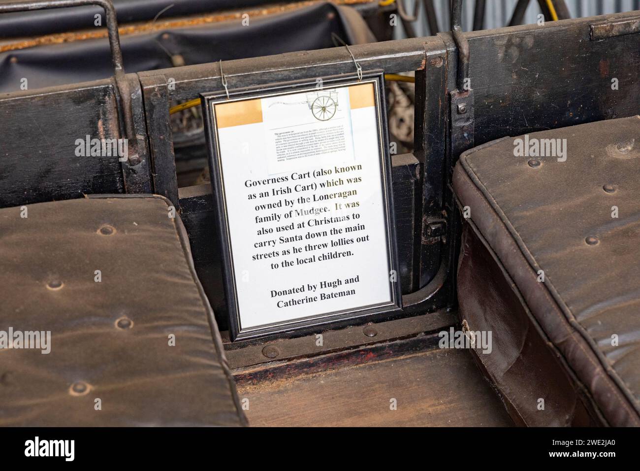 Governess cart or Irish cart, a horse drawn cart with inward facing ...
