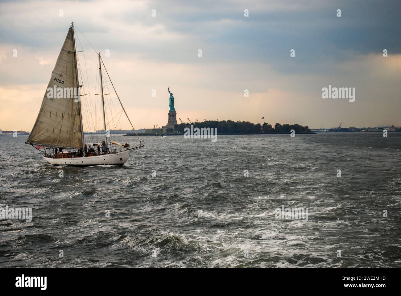 Sailing Yacht and the Statue of Liberty, New York Stock Photo - Alamy