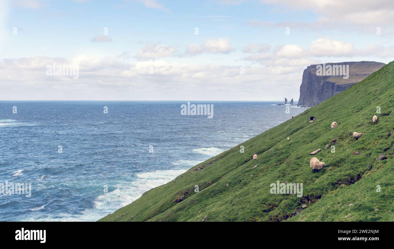 Risin and Kellingin, two iconic sea stacks off Faroe Islands. Legend ...